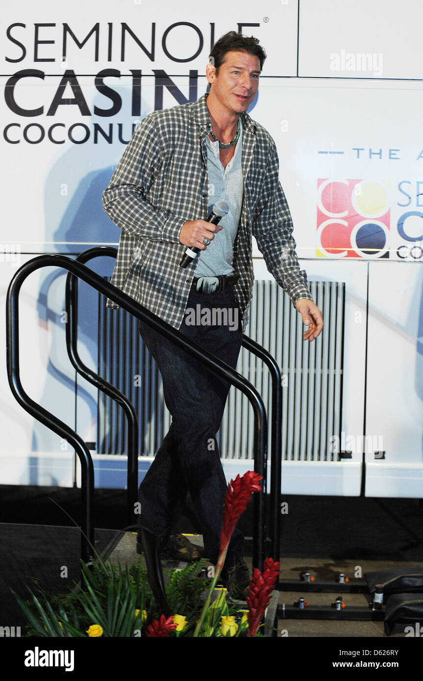 Ty Pennington 'Moves That Bus' to celebrate the grand opening of the ...