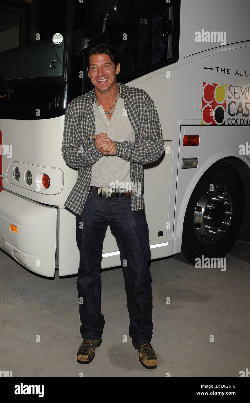 Ty Pennington 'Moves That Bus' to celebrate the grand opening of the ...