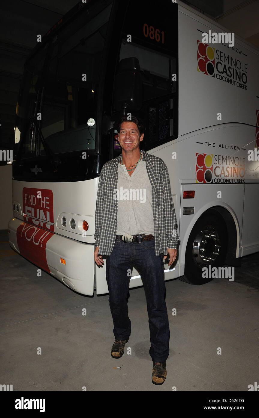 Ty Pennington 'Moves That Bus' to celebrate the grand opening of the ...