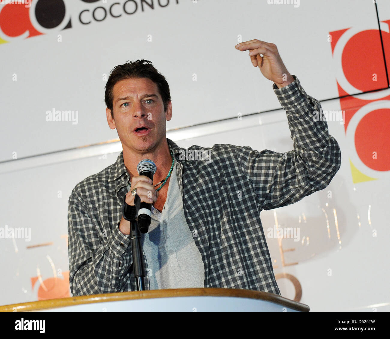 Ty Pennington 'Moves That Bus' to celebrate the grand opening of the ...