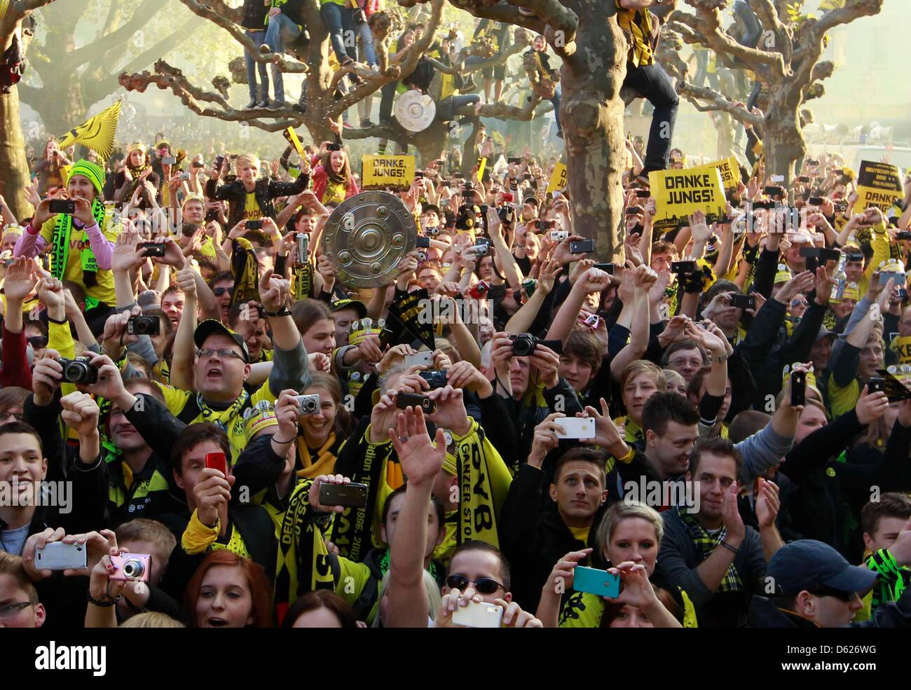 Supporters of German soccer champions Borussia Dortmund celebrate their ...