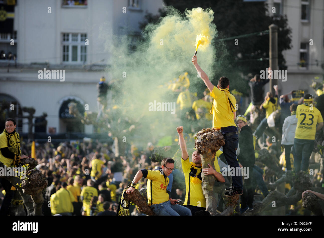 Fans of German Bundesliga soccer club Borussia Dortmund celebrate at ...