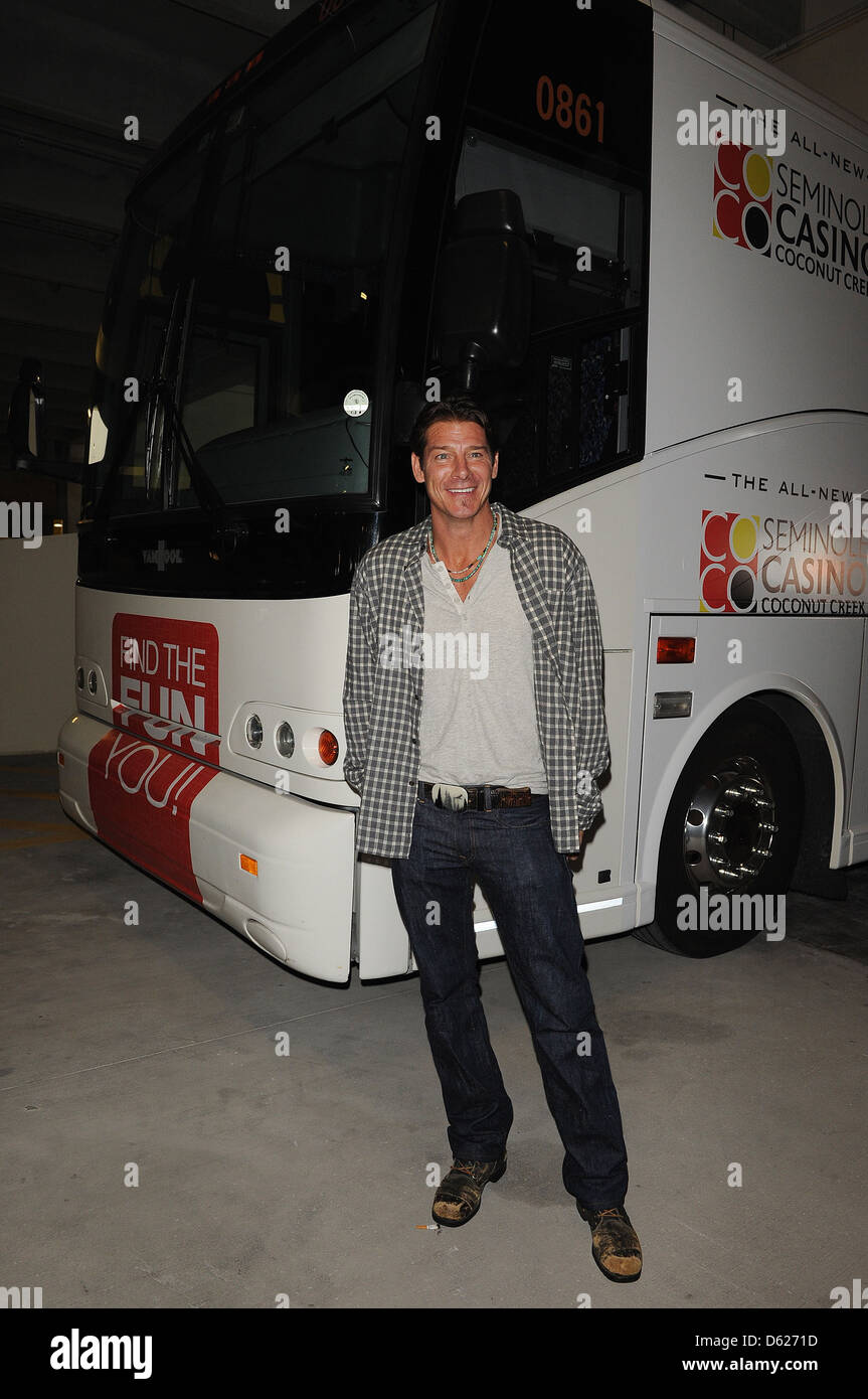 Ty Pennington 'Moves That Bus' to celebrate the grand opening of the ...