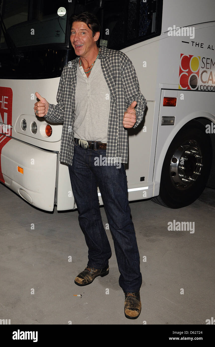Ty Pennington 'Moves That Bus' to celebrate the grand opening of the ...