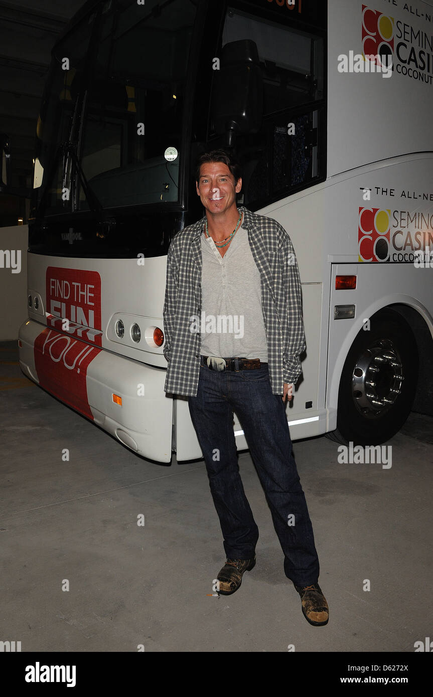 Ty Pennington 'Moves That Bus' to celebrate the grand opening of the ...