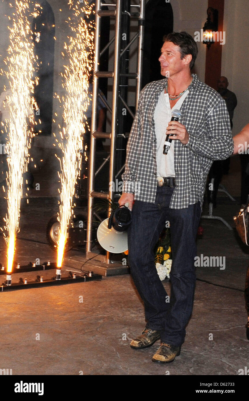 Ty Pennington 'Moves That Bus' to celebrate the grand opening of the ...