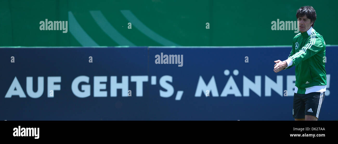 German national soccer coach Joachim Loew supervises a practice session ...