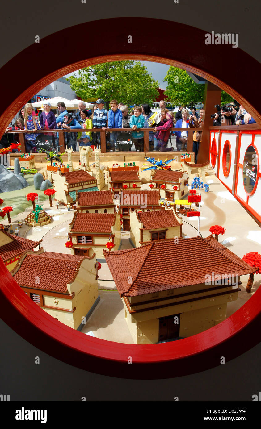 Visitors watch the Ninjago Miniland of the Legoland theme park in ...