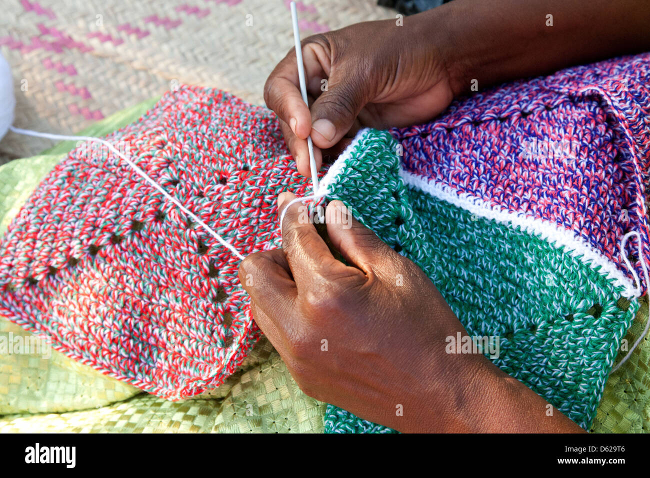 Close up of African hands knitting Stock Photo Alamy