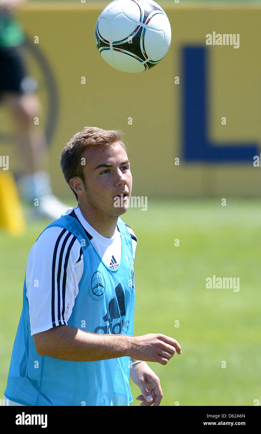 German national soccer player Mario Goetze plays the ball during a ...