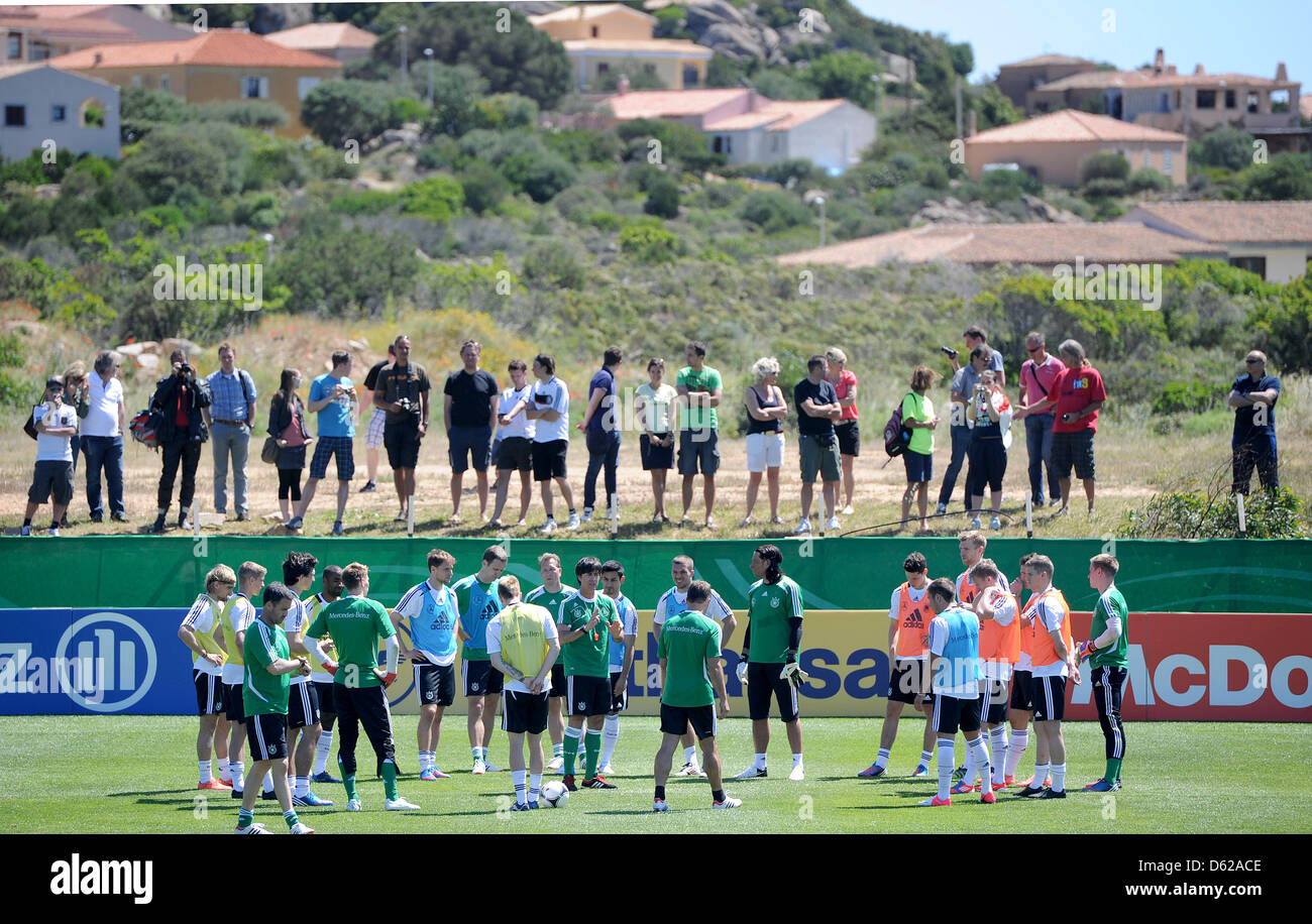 German national soccer coach Joachim Loew (C) instructs his players ...