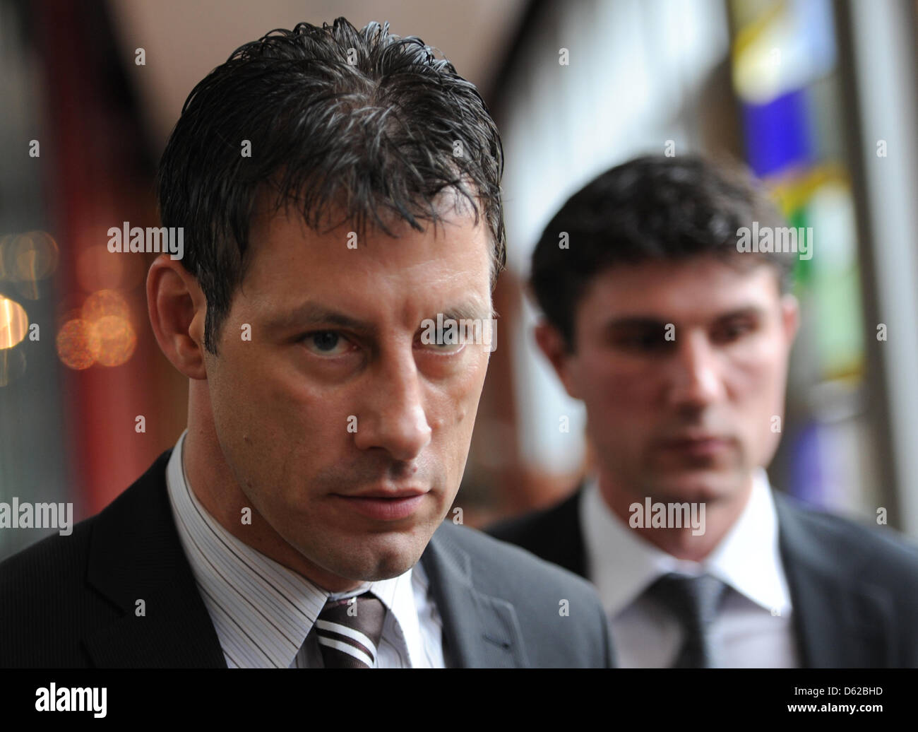 Referee Wolfgang Stark (L) and fourth official Markus Wingenbach are on ...