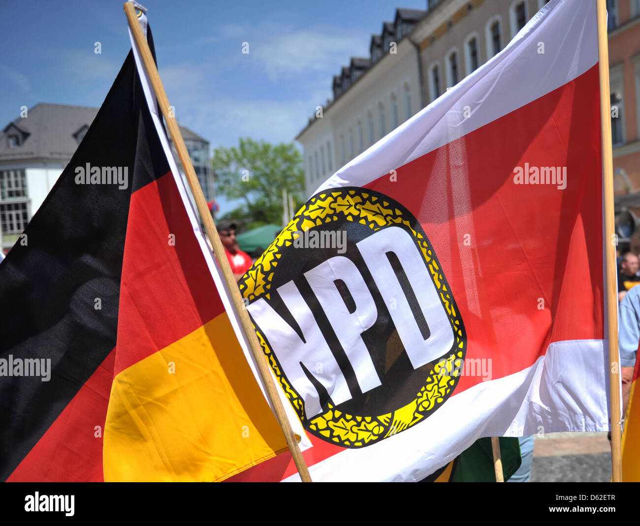 A flag of the far-right German nationalist party NPD flies at ...