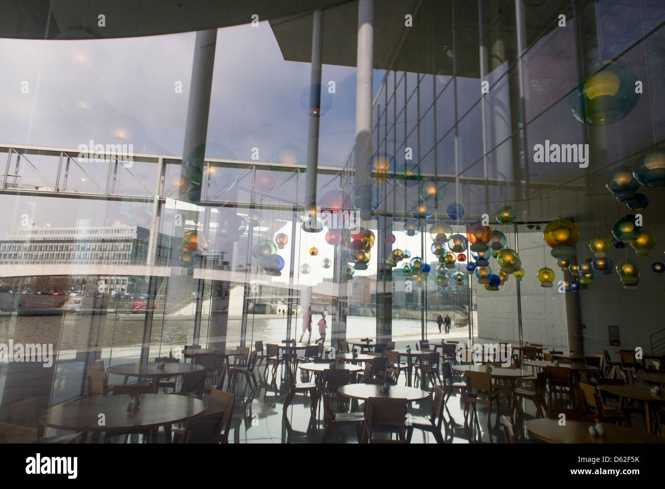 Joggers pass the restaurant of Paul-Loeb-Haus in Berlin Mitte, one of ...