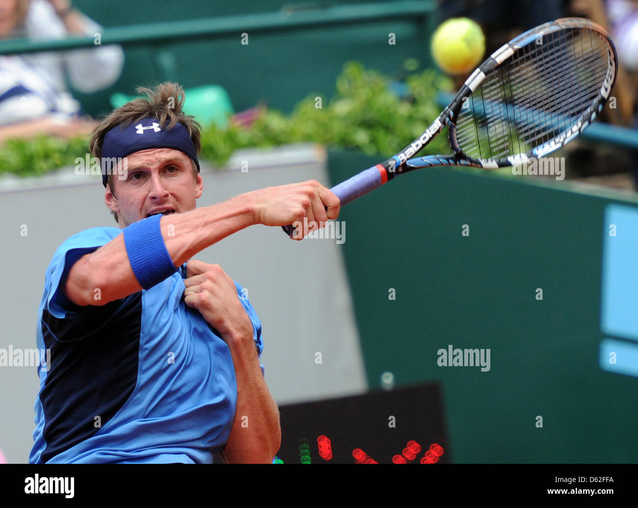 Russia's Igor Andreev plays in a single against Mayer (Germany) during ...