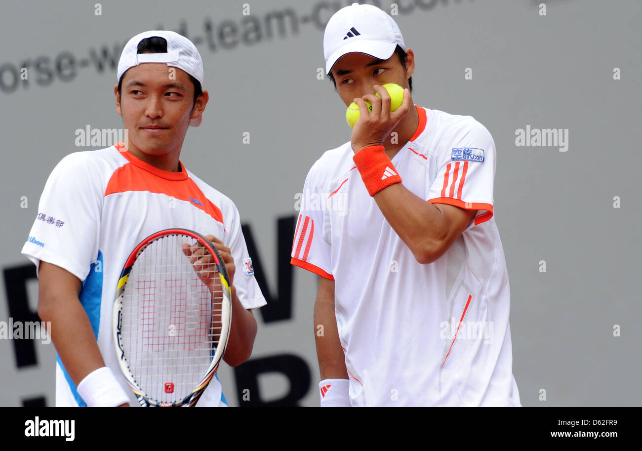 Japan's Go Soeda (L) and Tatsuma Ito play in the double match Soeda/Ito ...