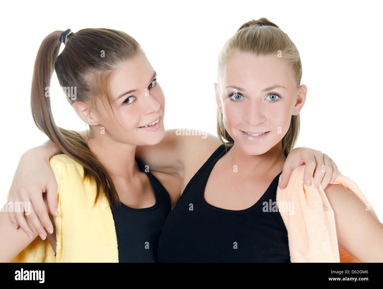 Two sports woman isolated on white Stock Photo - Alamy