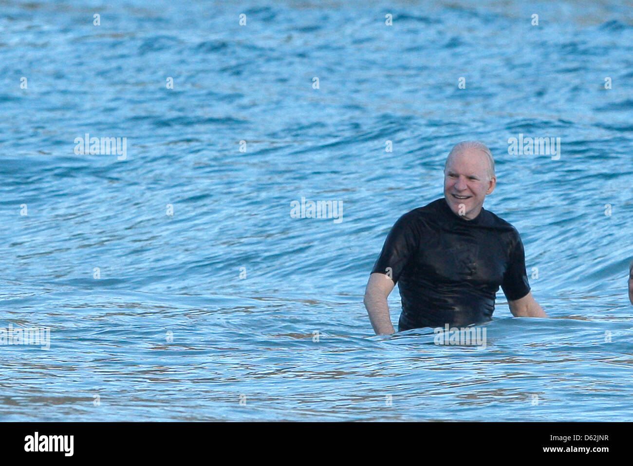 Steve Martin taking a quick swim in the ocean Celebrities relaxing on ...