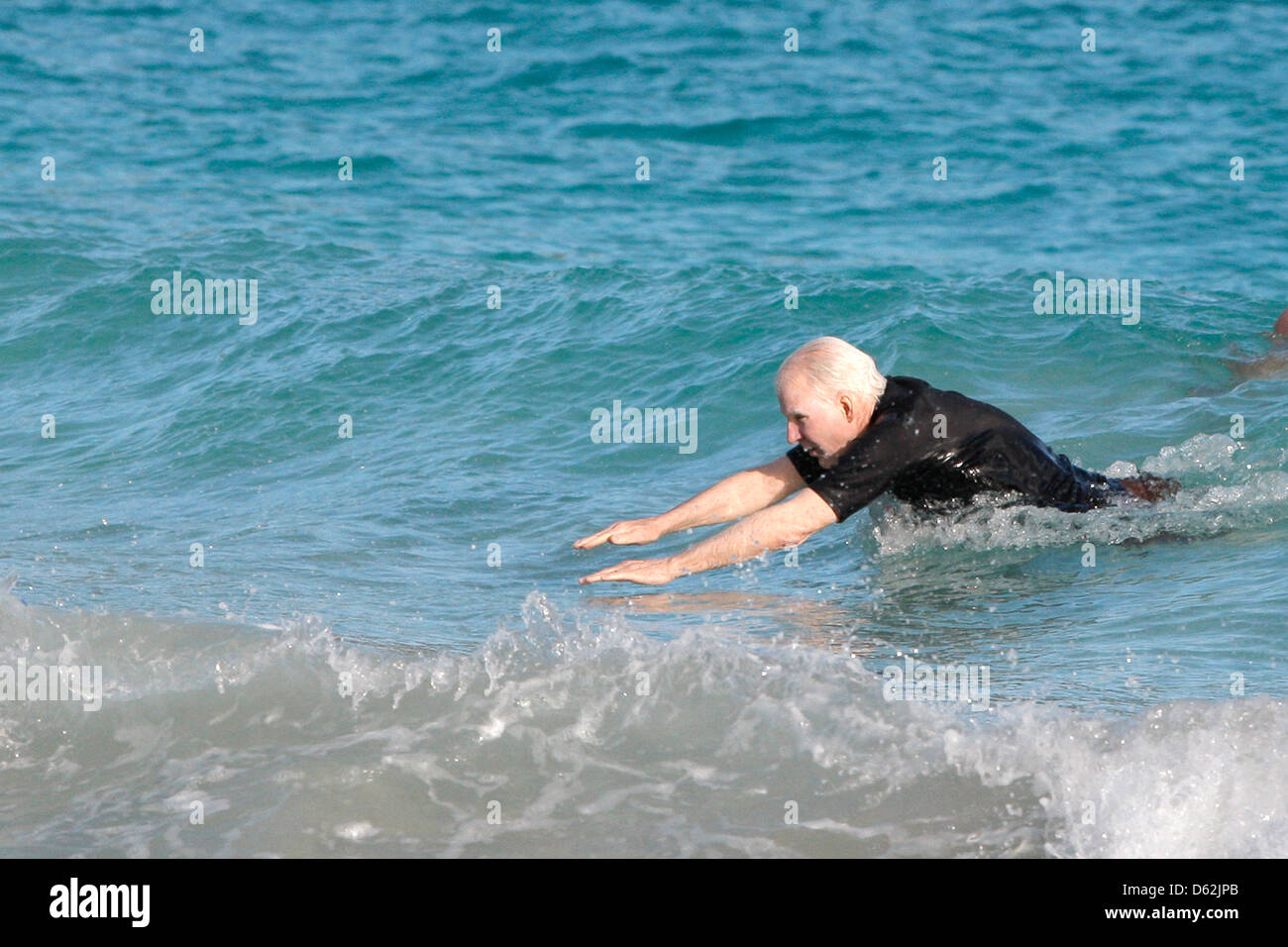 Steve Martin taking a quick swim in the ocean Celebrities relaxing on ...