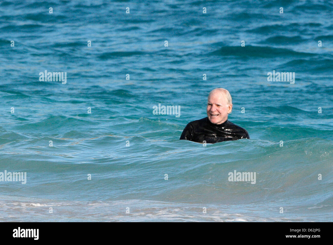 Steve Martin taking a quick swim in the ocean Celebrities relaxing on ...
