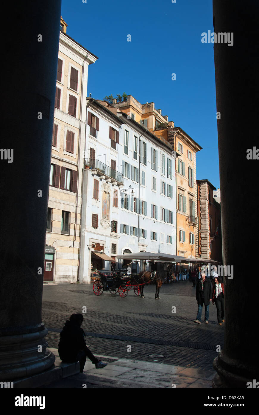ROME, ITALY. A view of Piazza della Rotonda framed by the columns of ...
