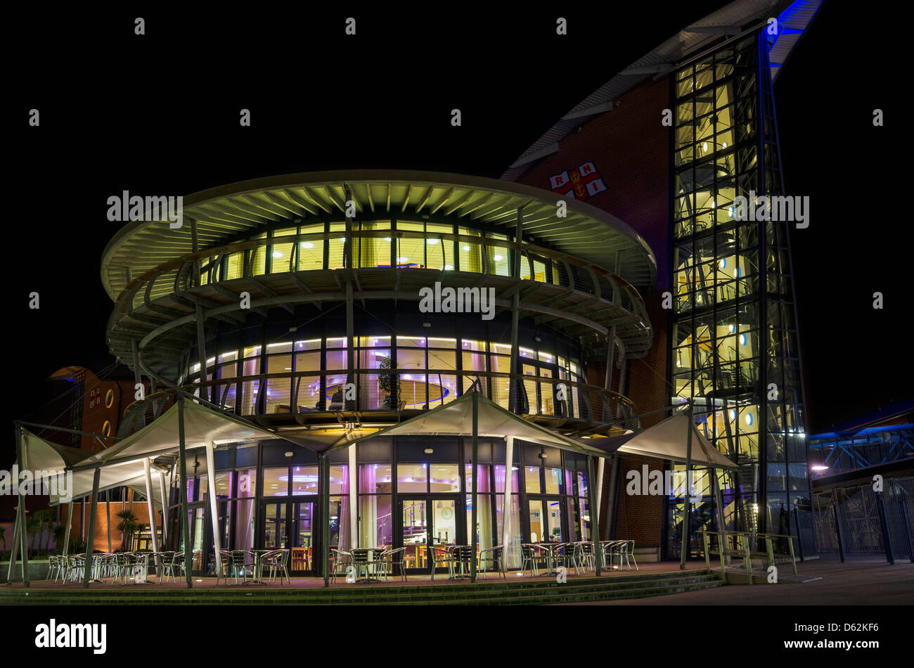 The RNLI Lifeboat college in Poole, Dorset, illuminated at night Stock ...