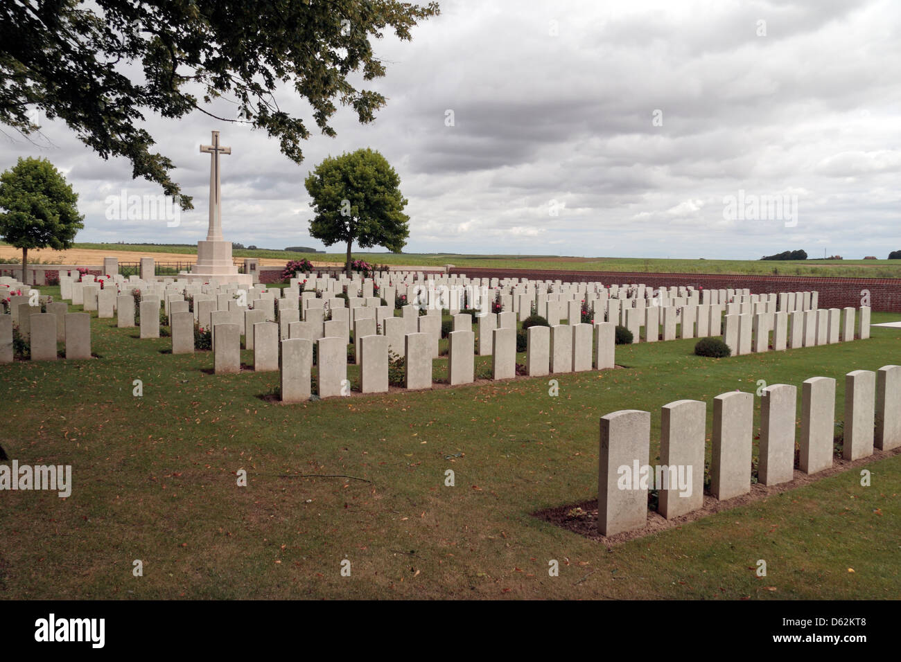 General view of the Cross of Sacrifice & headstones in the CWGC Euston ...