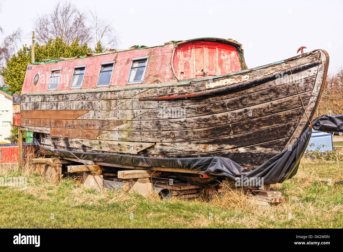 An old canal boat that has been waiting restoration for several years Stock Photo - Alamy