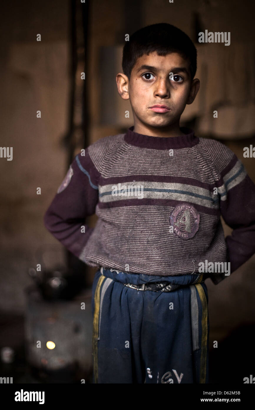 11/02/13 Aleppo,Syria. Portrait of young boy in the war torn city of ...