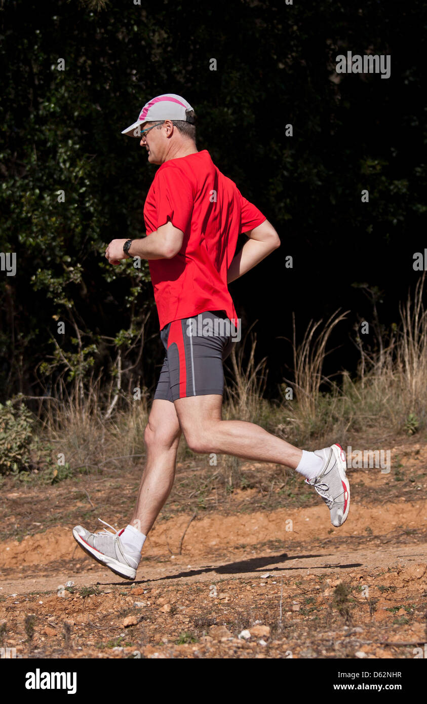 Young runner while training for a competition Stock Photo - Alamy