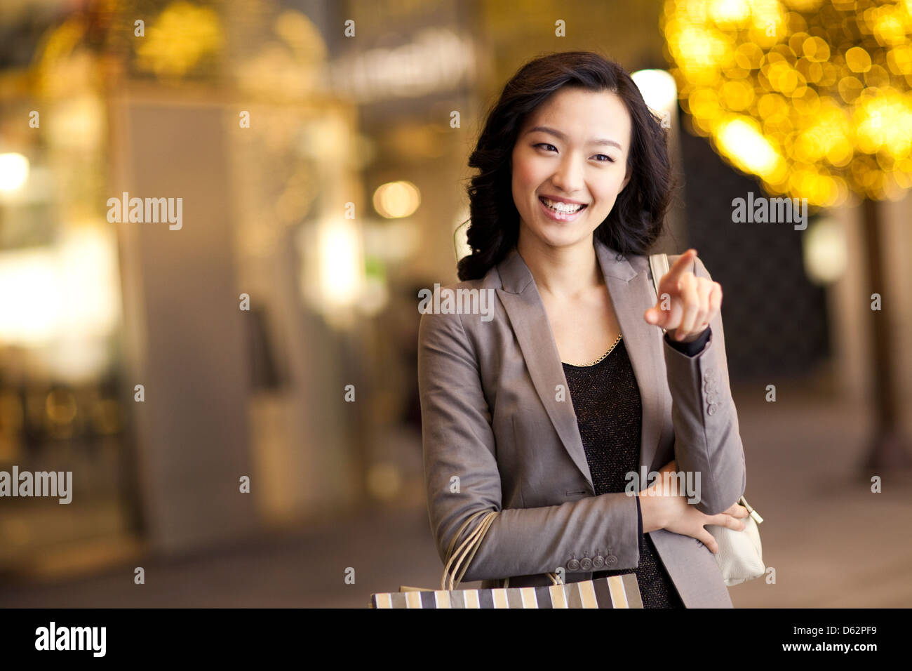 Woman pointing forward hi-res stock photography and images - Alamy