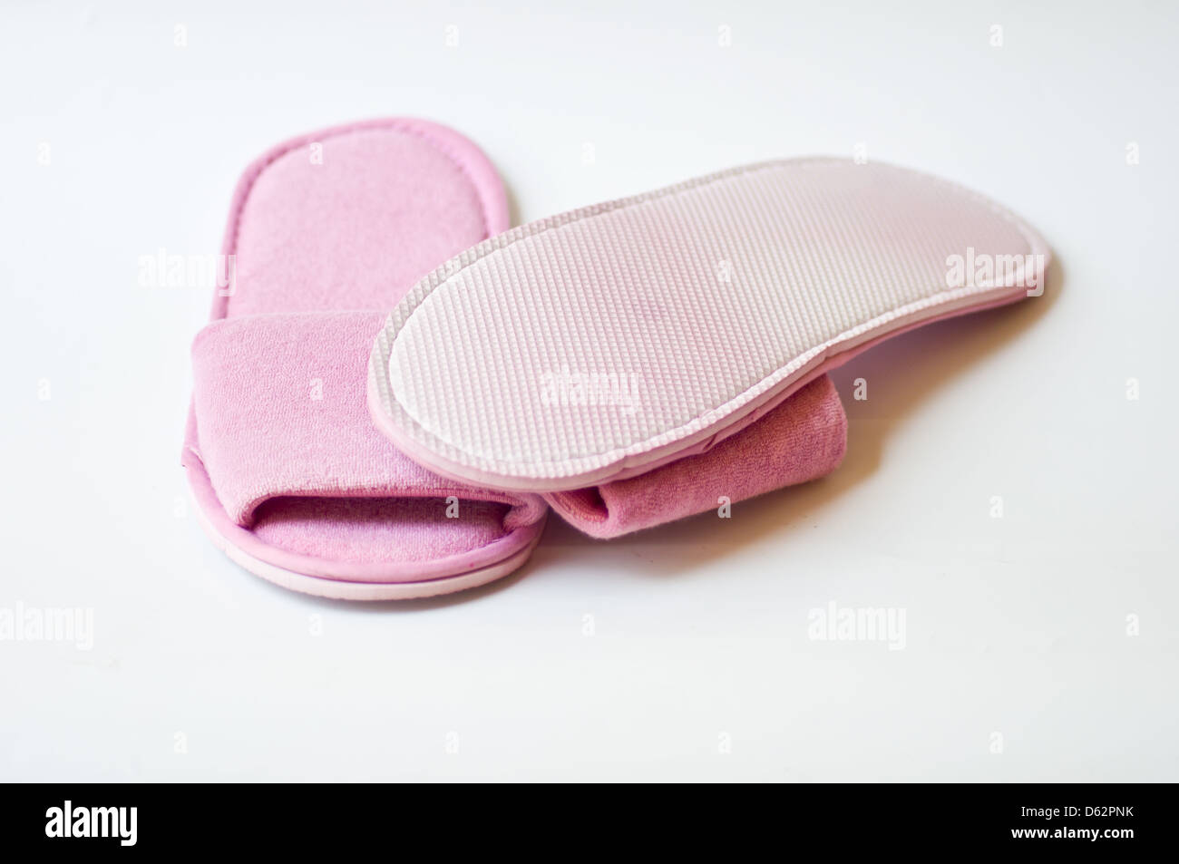 violet slipper on white background for use in house Stock Photo - Alamy
