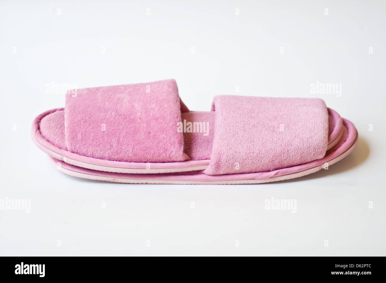 violet slipper on white background for use in house Stock Photo - Alamy