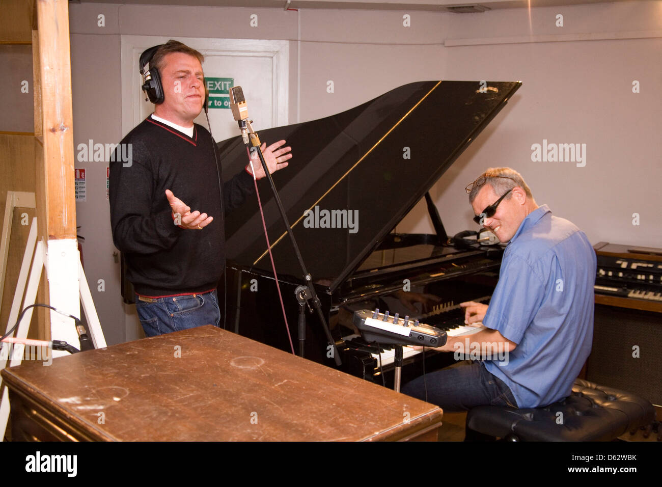 Suggs and Mike Barson from Madness at the Moloko studios London England ...