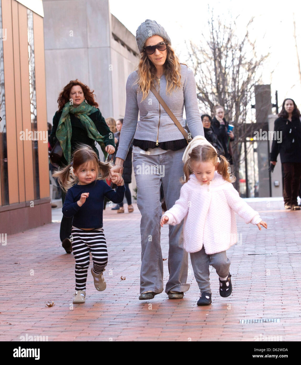 Sarah Jessica Parker out for a walk with her twin daughters Tabitha ...