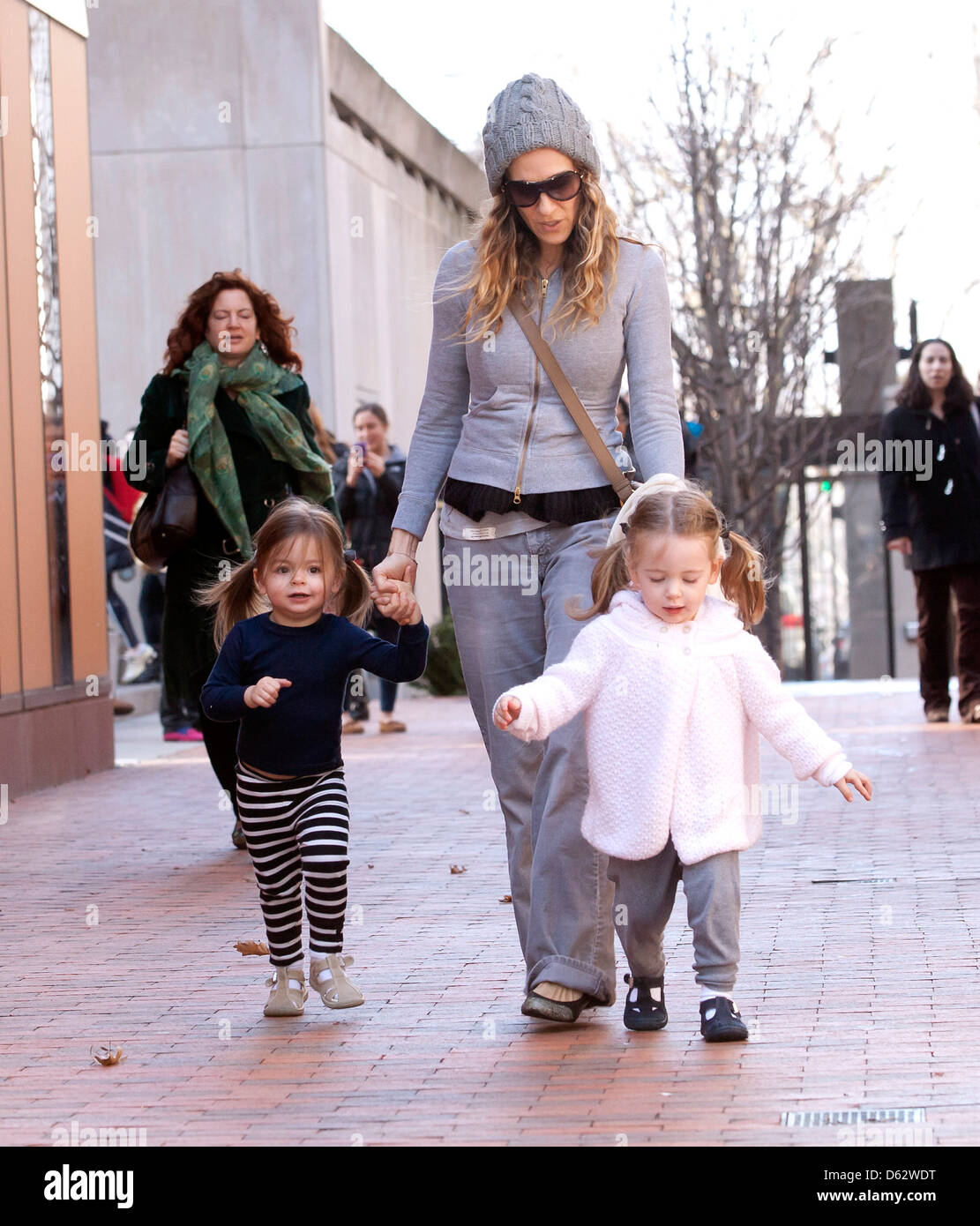 Sarah Jessica Parker out for a walk with her twin daughters Tabitha ...