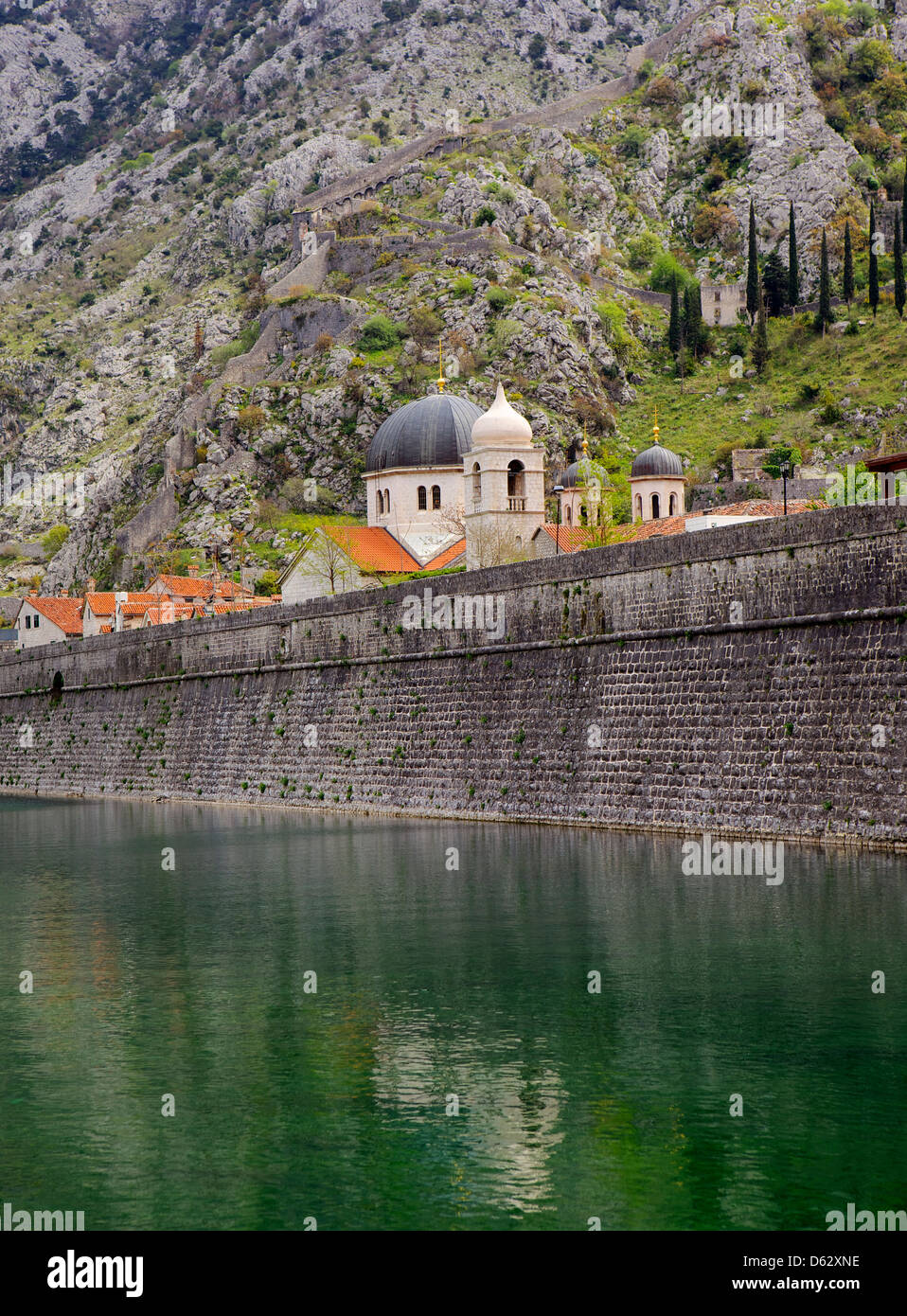 City Walls surround UNESCO world heritage site of Kotor, Montenegro ...
