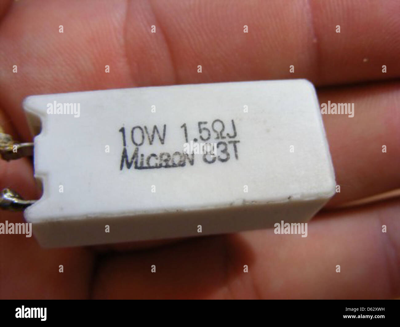 This image shows a ceramic encapsulated resistor, a component commonly ...