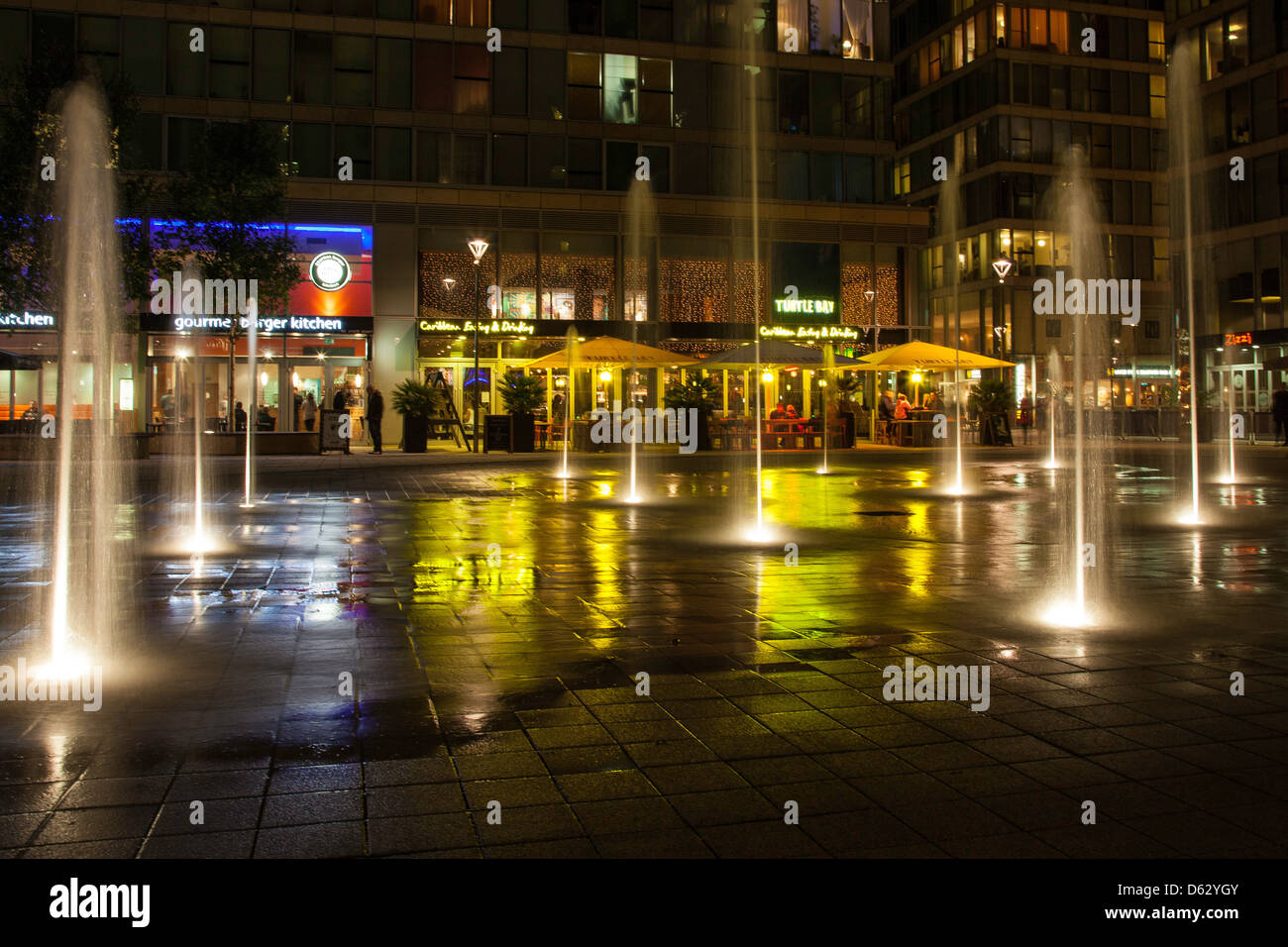 Fountains and lights in The Hub, a public square in Milton Keynes ...