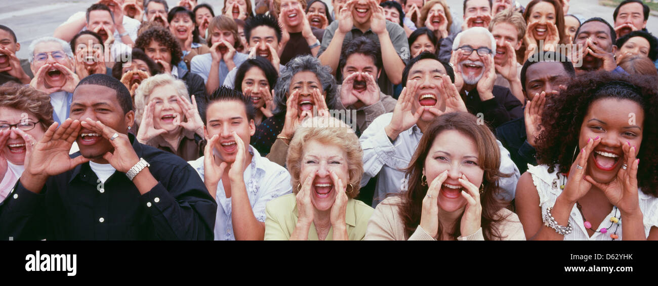 Panoramic shot of crowd shouting with hands face Stock Photo - Alamy