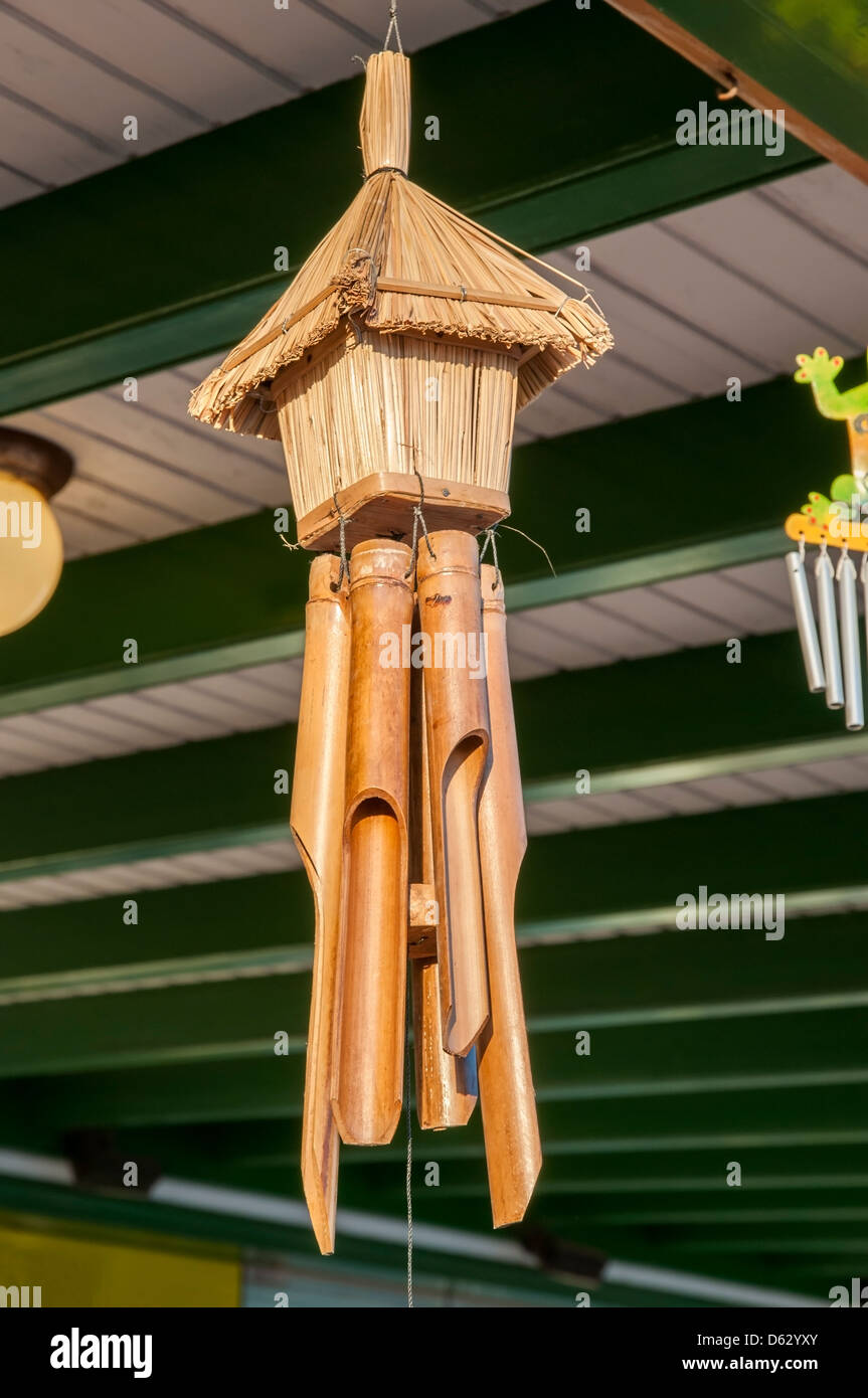 Hanging objects consisting of a house with a few pieces of cane Stock ...