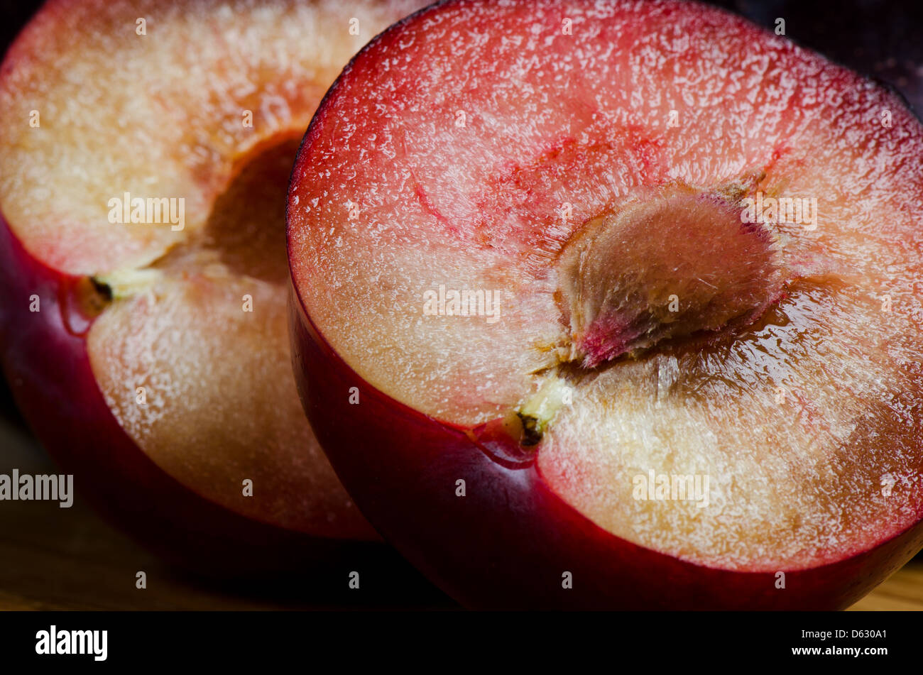 Cut plum hi-res stock photography and images - Alamy