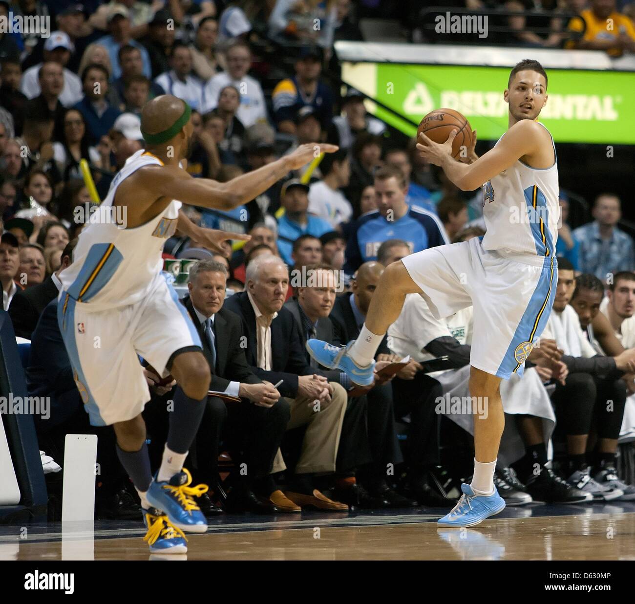 Denver, Colorado, U.S. April 10, 2013. Nuggets EVAN FOURNIER, right ...