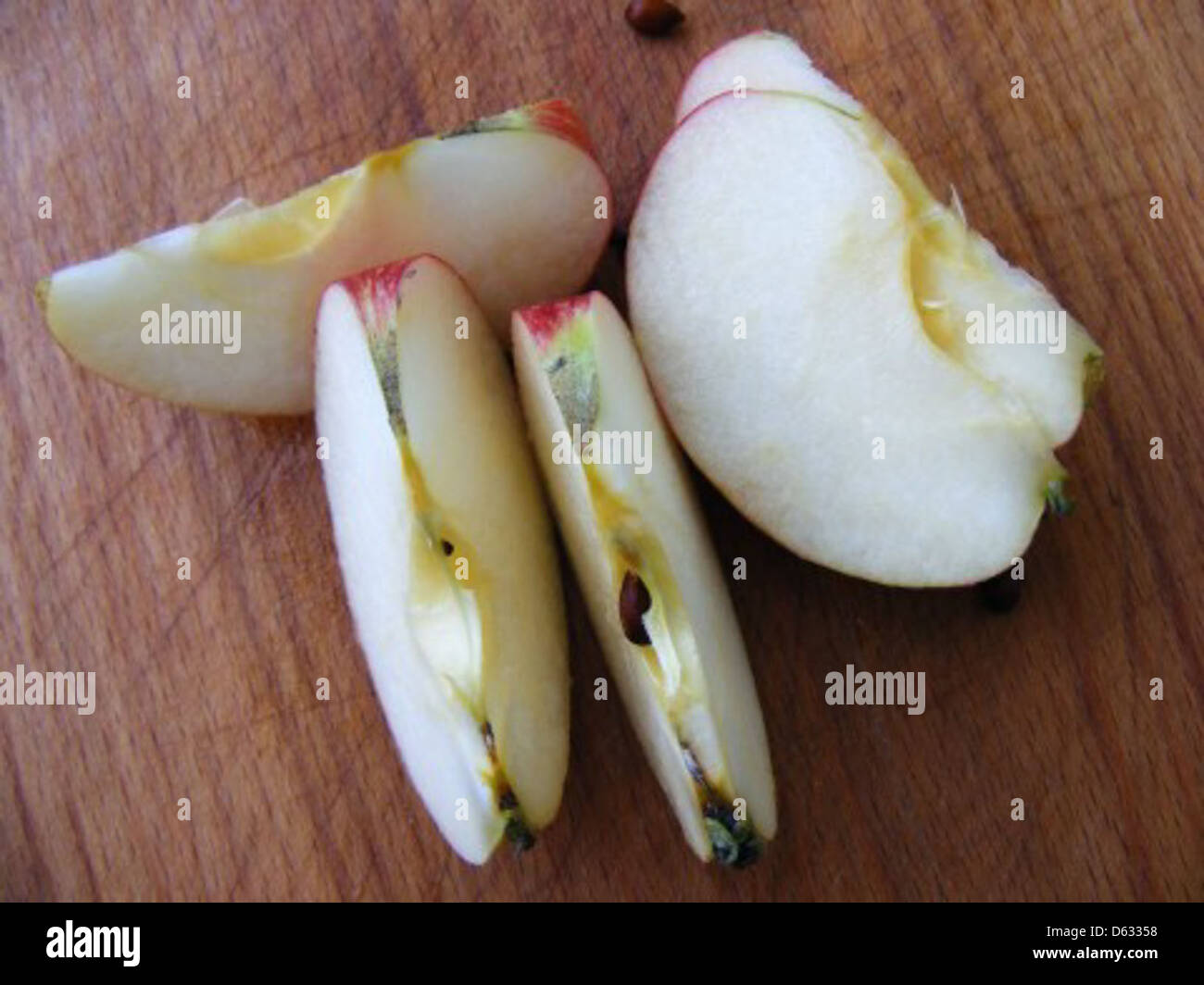 Freshly cut apple slices, showcasing the crisp texture and vibrant ...