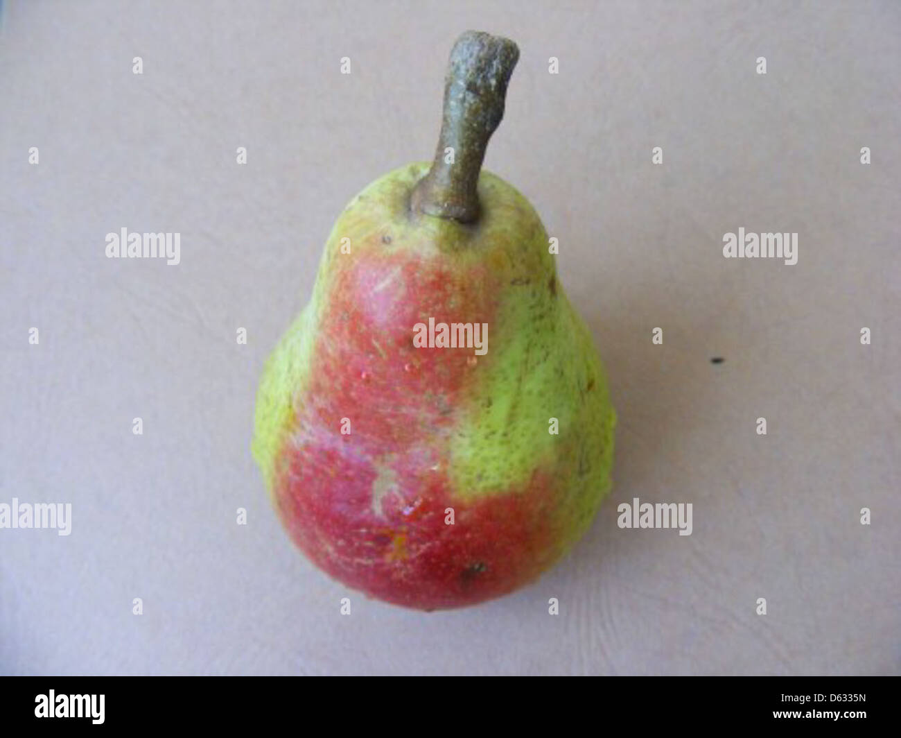 This image features fresh, delicious pears, a popular fruit known for ...