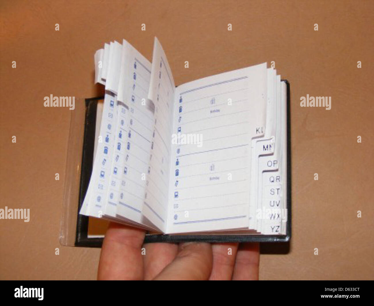 An organizer phone book, designed for storing contact information and ...