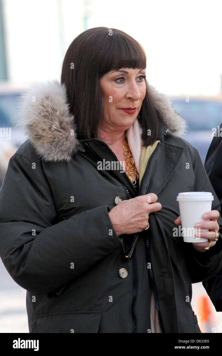 Anjelica Huston braving the cold weather on the set of "Smash" filming ...