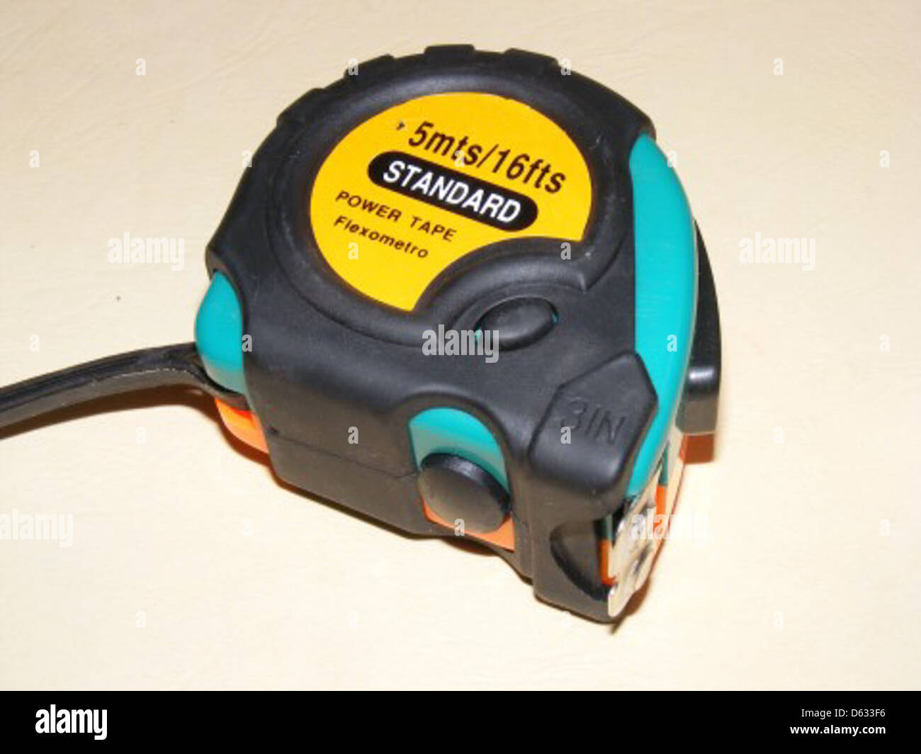 A power tape measure with a metric scale, designed for precise ...