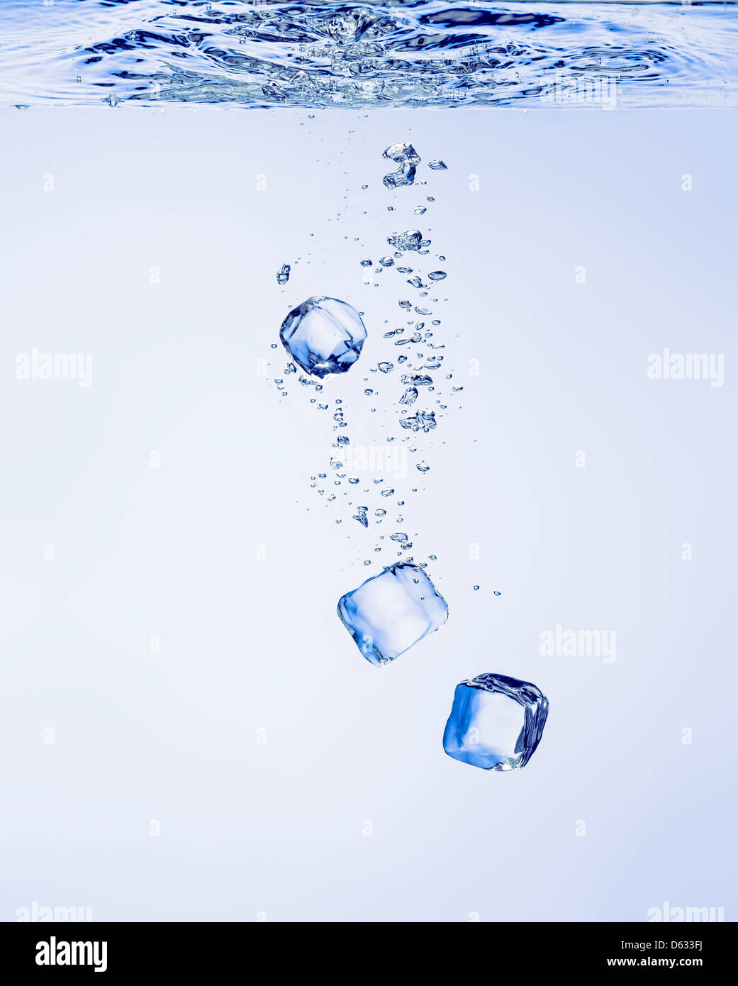 Ice cube falling into liquid hi-res stock photography and images - Alamy