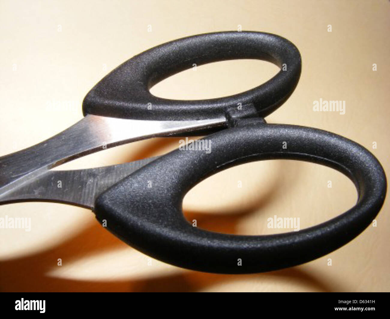 A pair of stainless steel scissors, commonly used for cutting various ...